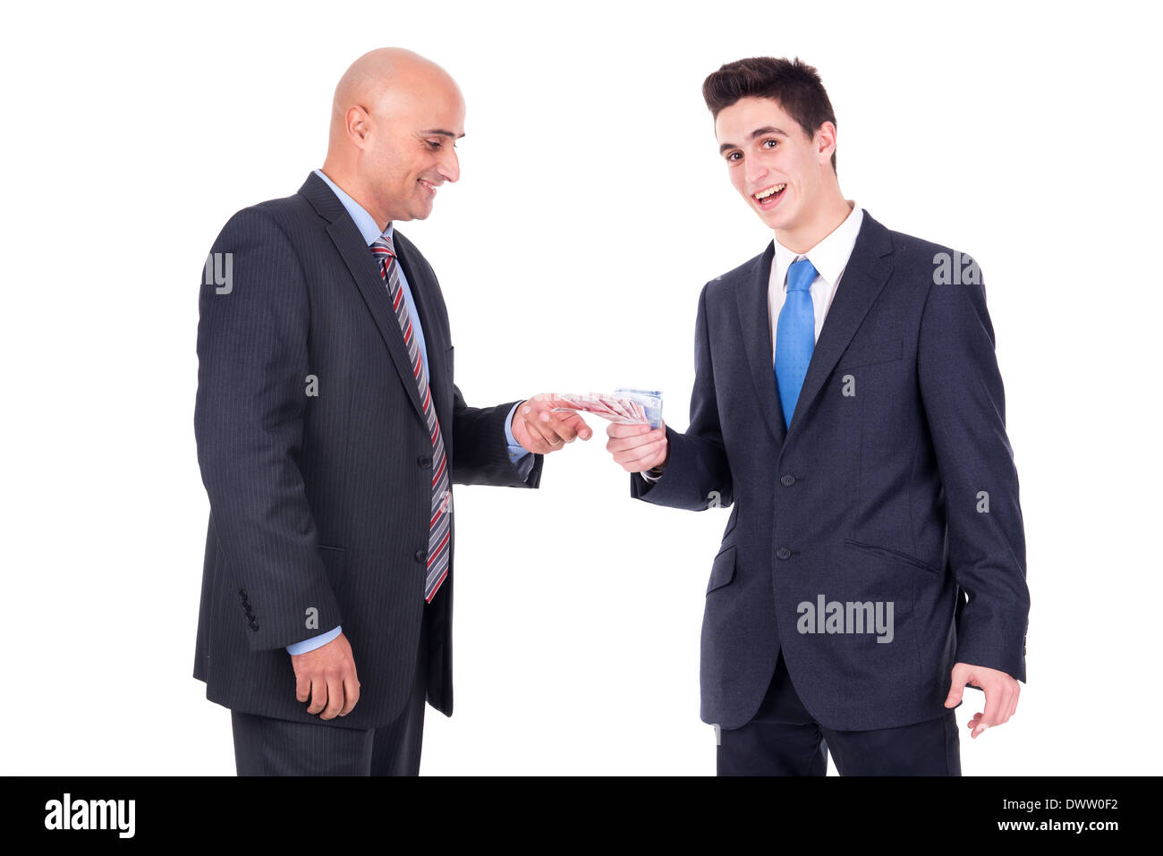 Businessman giving money another businessman hi-res stock photography ...