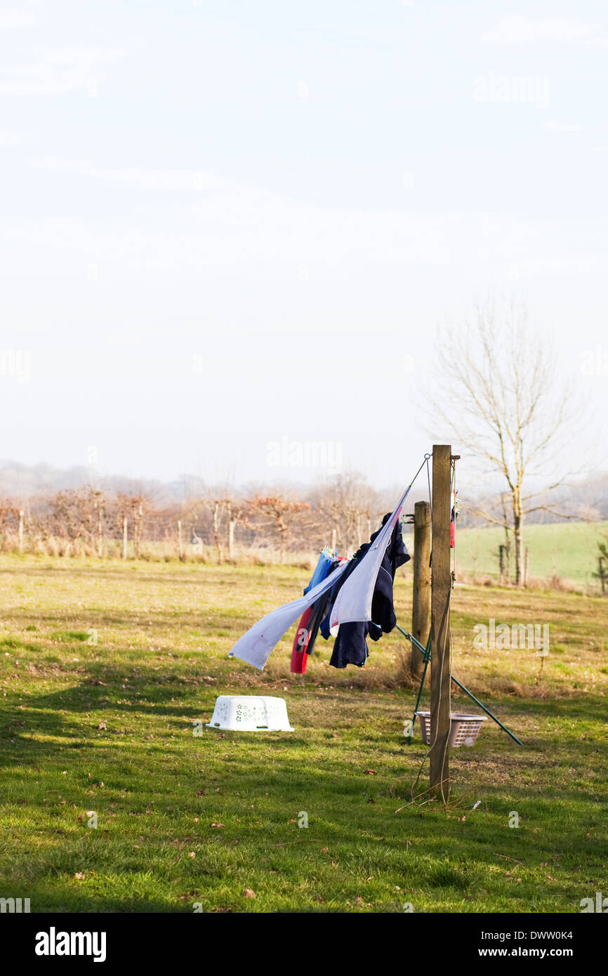 Washing on a line blowing in a breeze Stock Photo - Alamy