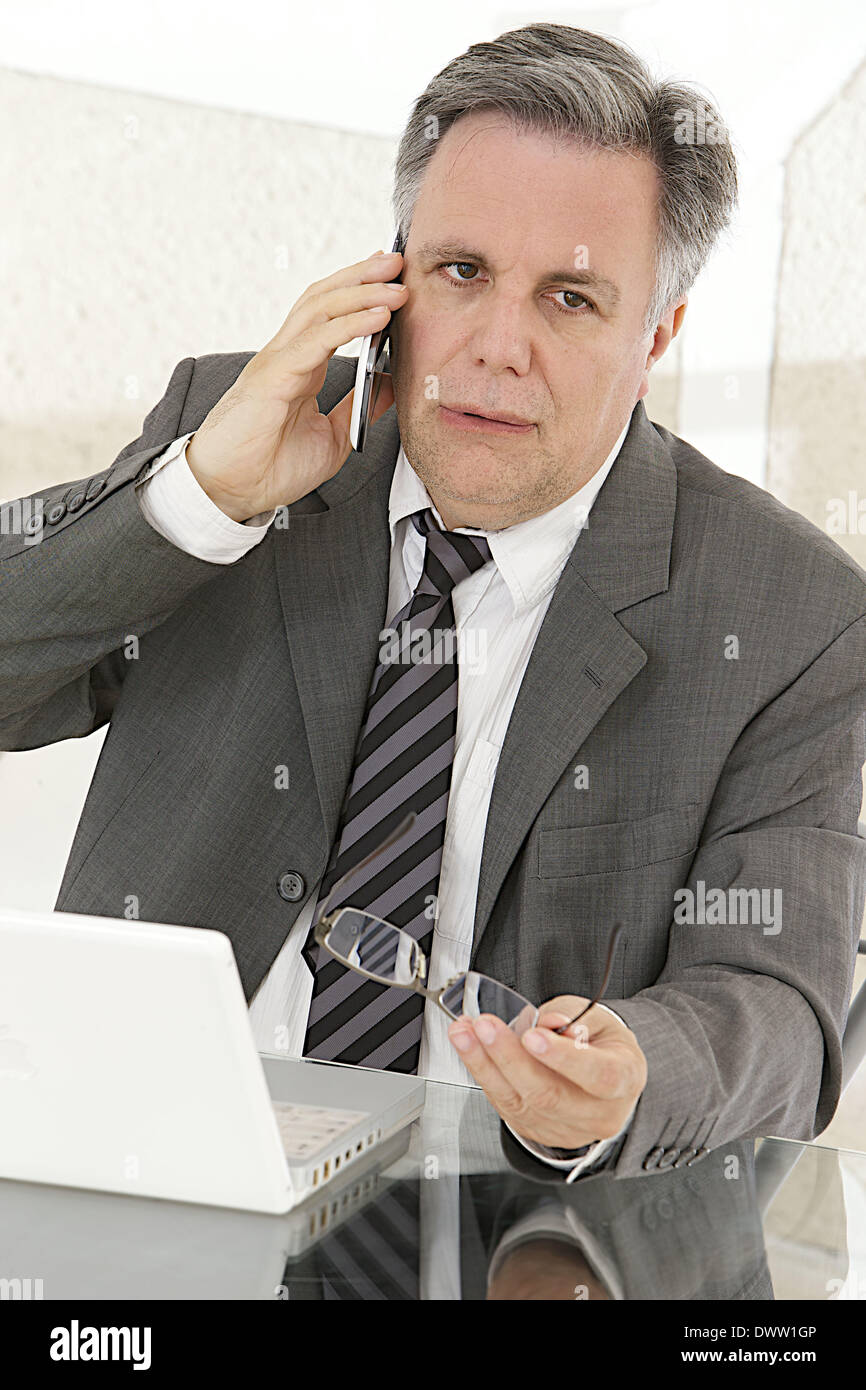 Mobile phone businessman Stock Photo - Alamy