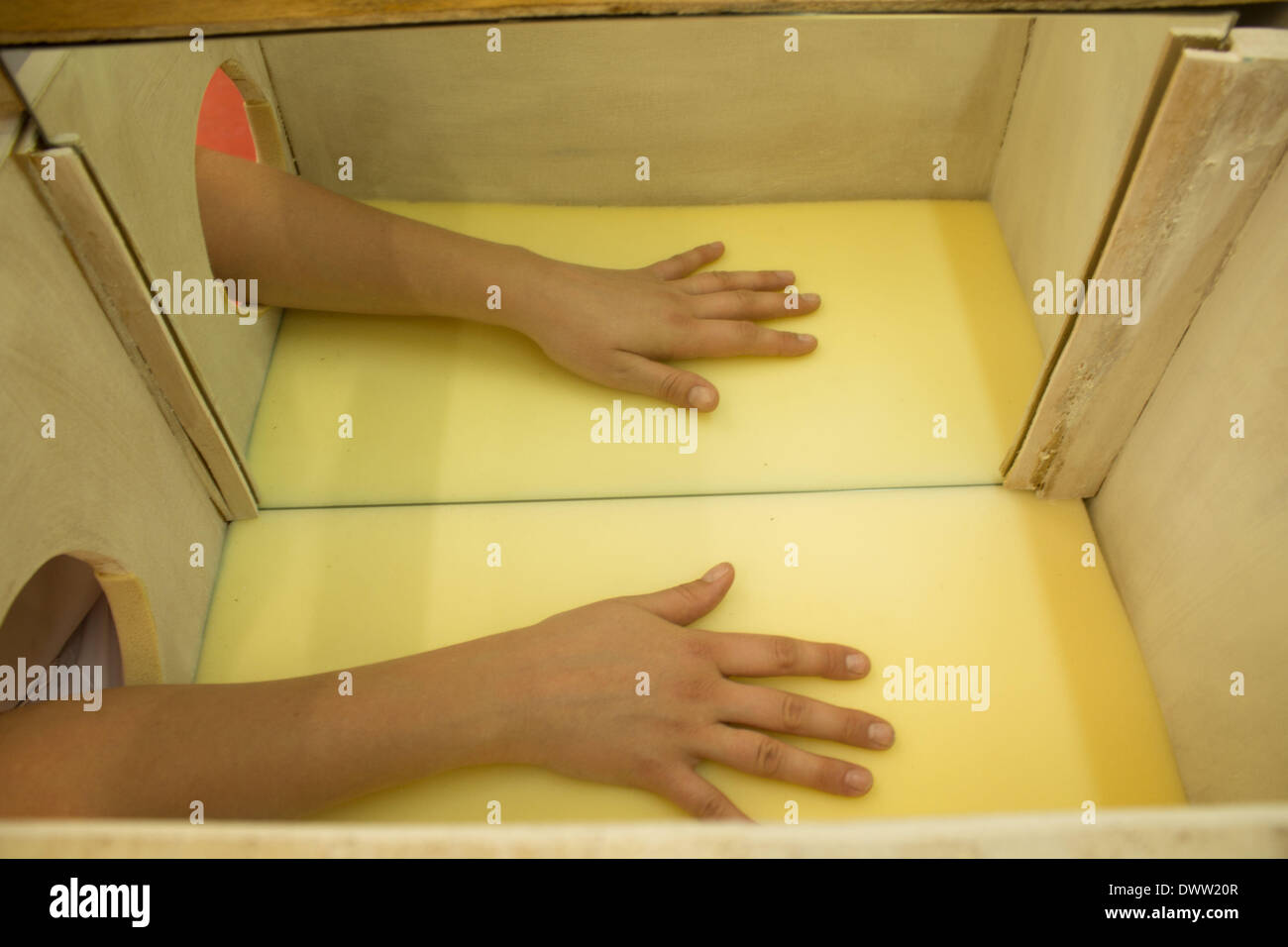 Mirror box ergotherapy Stock Photo - Alamy