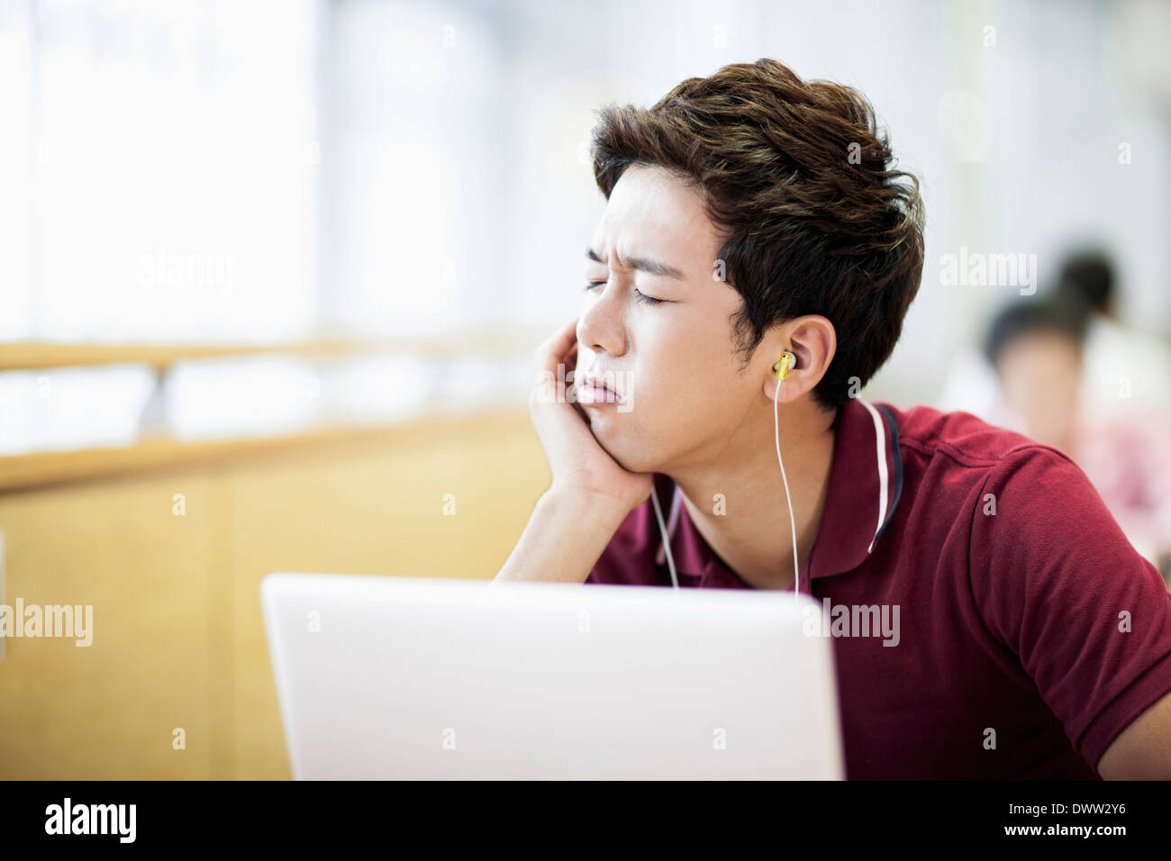 a boy studying in the library Stock Photo - Alamy