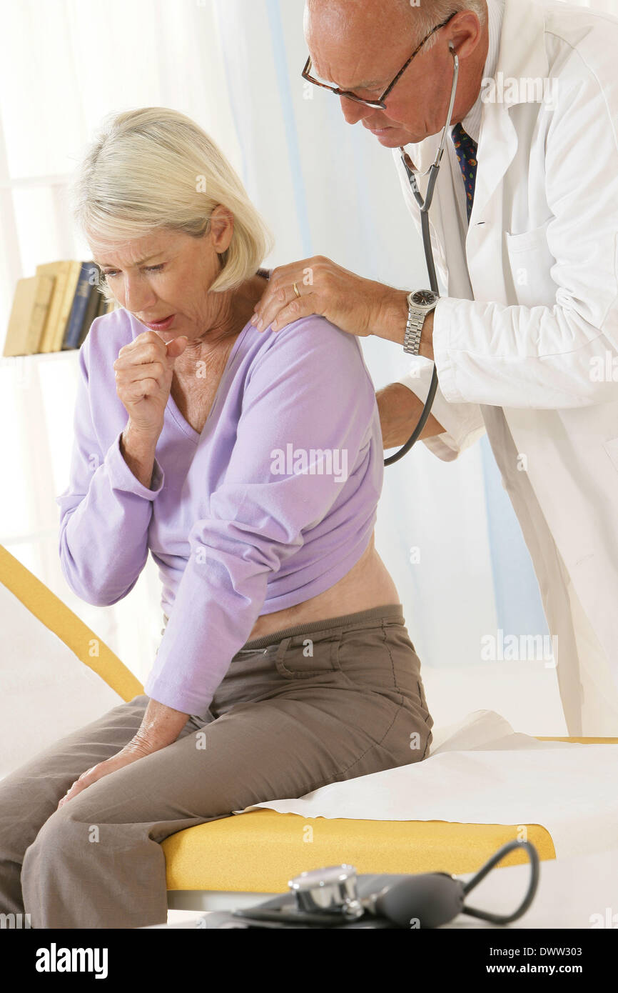 Auscultation senior woman Stock Photo - Alamy