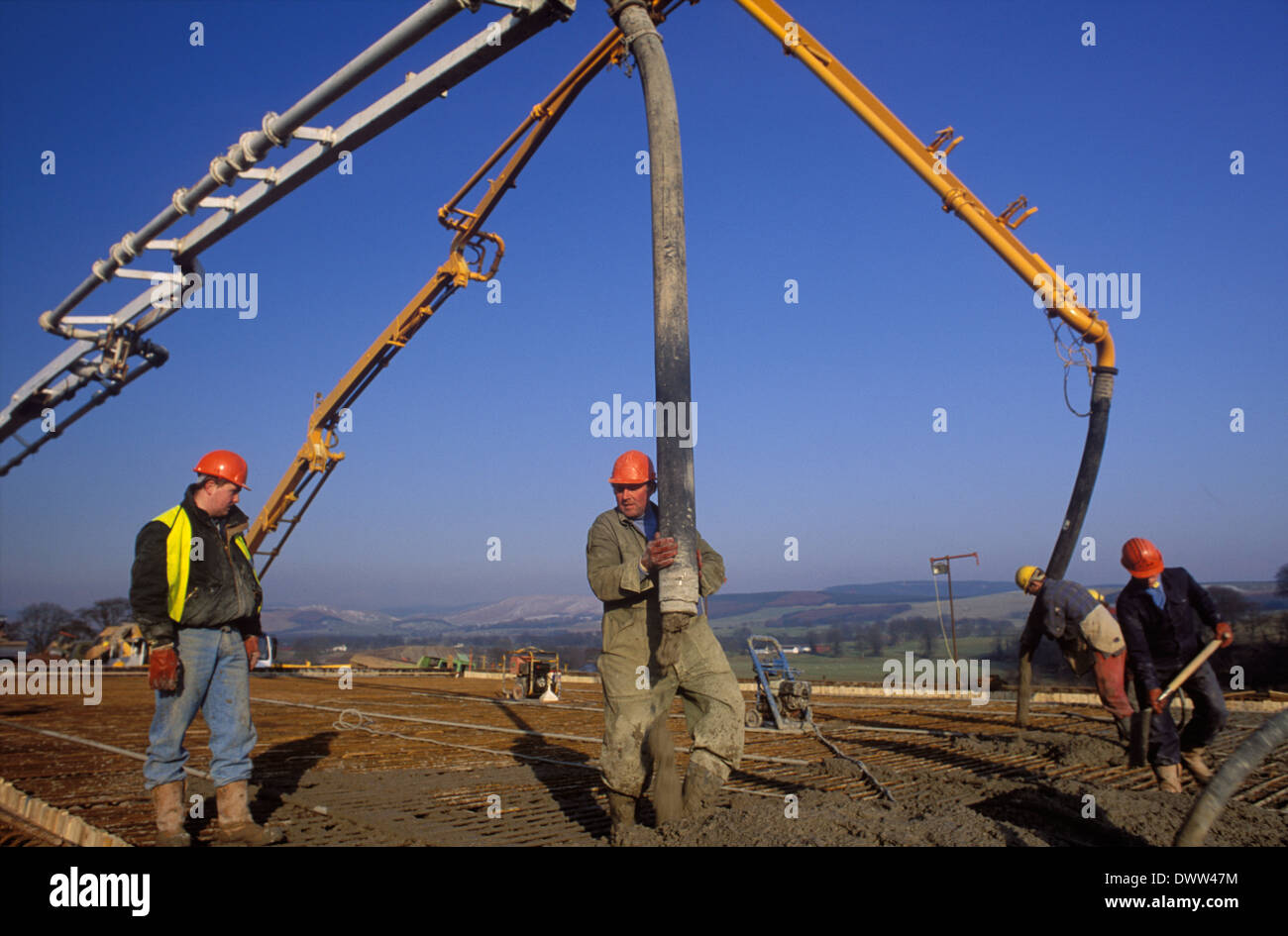 Motorway Construction, Pouring and levelling concrete Stock Photo - Alamy