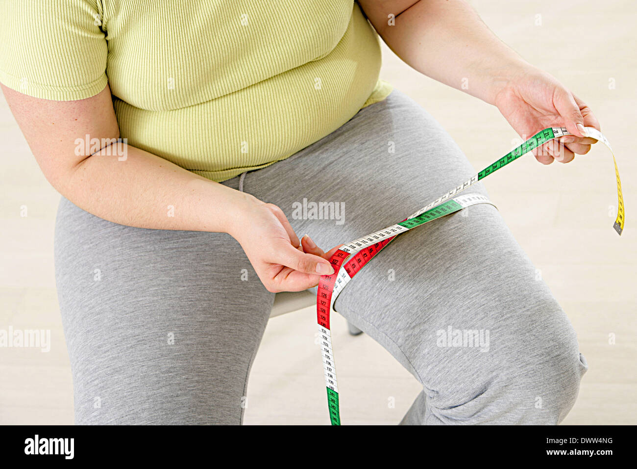 Thigh measurement woman Stock Photo - Alamy