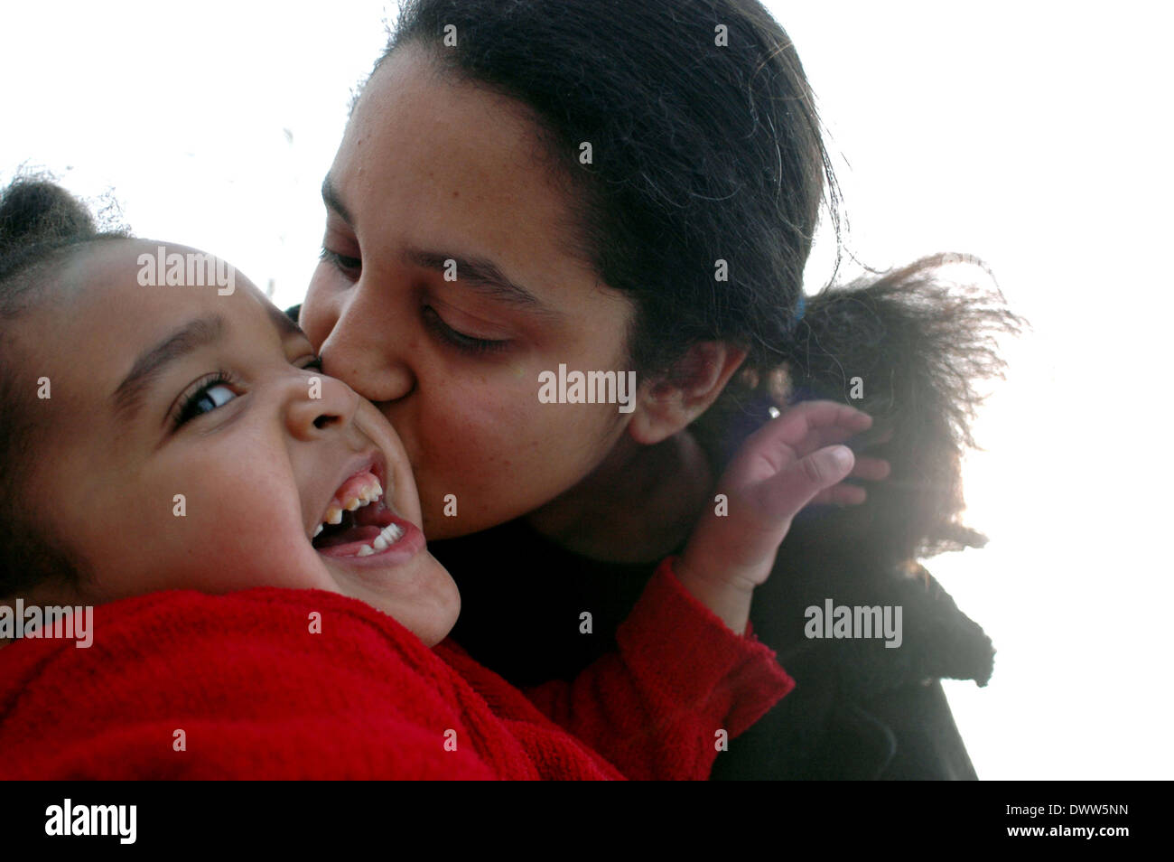 Mother kiss daughter hi-res stock photography and images - Alamy