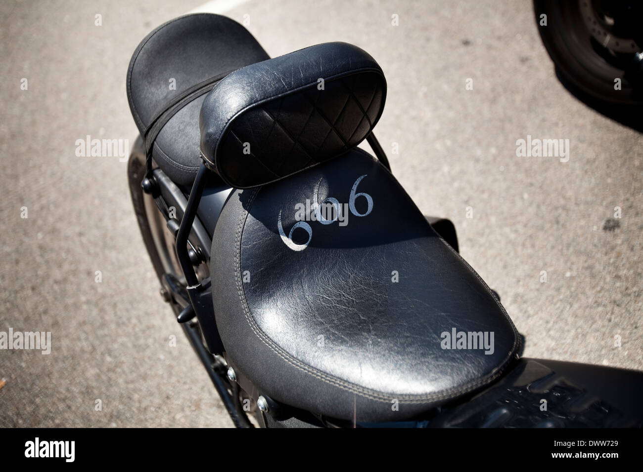 Black leather seat with 666 printed of a Harley Davidson motor bike ...