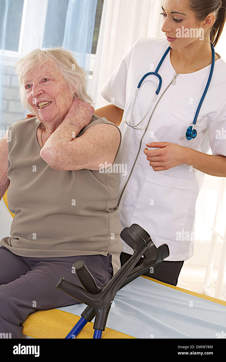 Nape of the neck pain senior Stock Photo - Alamy