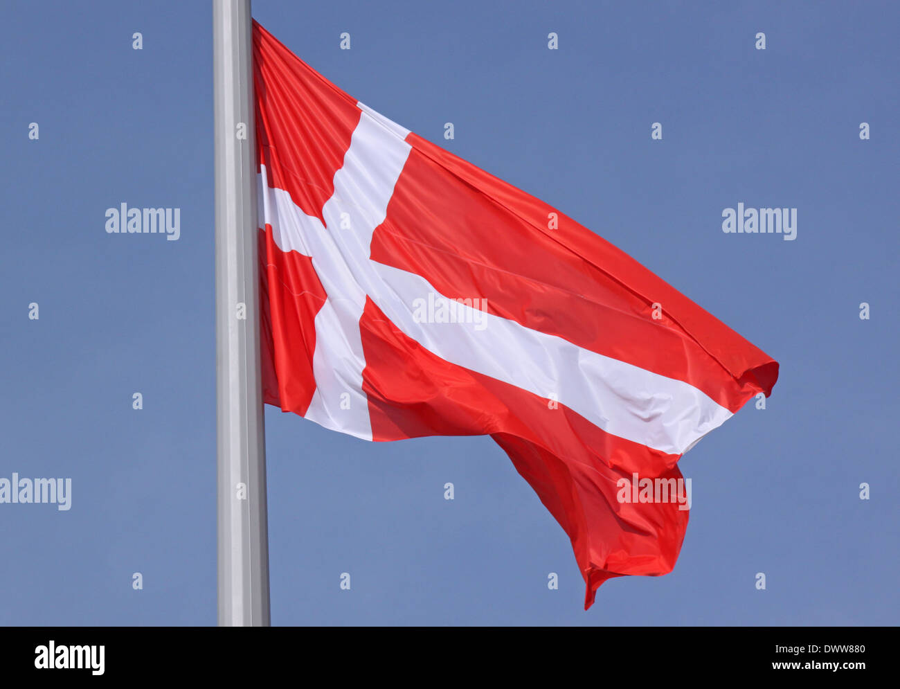flag of Denmark over blue sky Stock Photo - Alamy