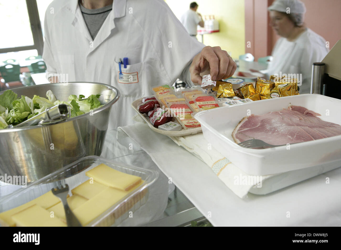 Woman cheese kitchen europe hi-res stock photography and images - Alamy