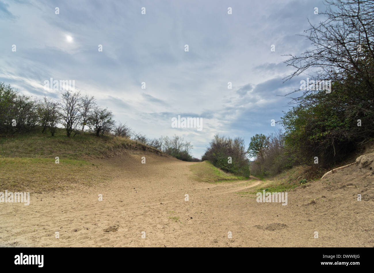 Prairie terrain surrounded by a small sand dunes Stock Photo - Alamy