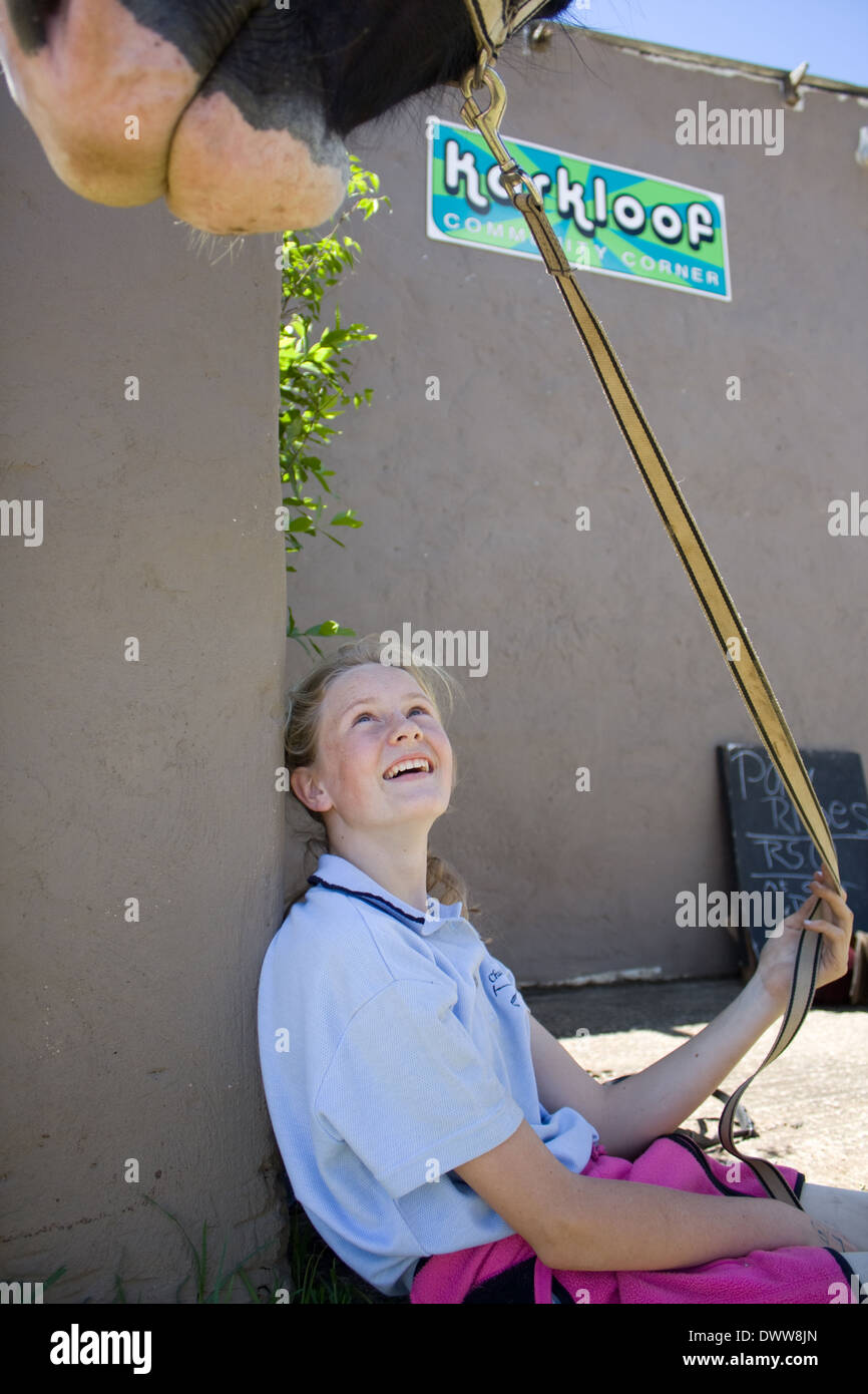 Daisy Scott-Barnes (12) offers pony rides on her horse McGuiness at the ...