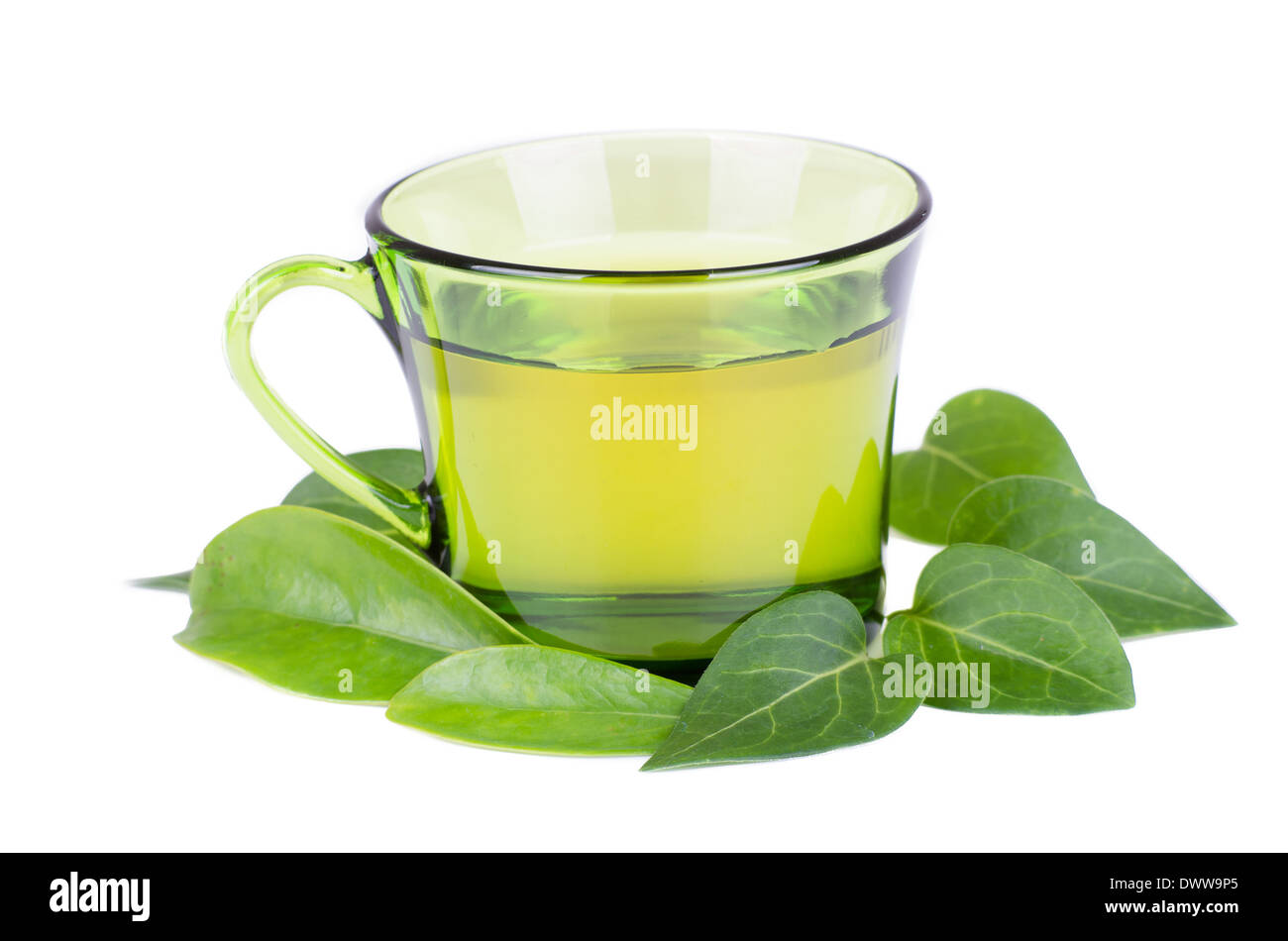 glass cup with fresh green tea leaves Stock Photo - Alamy