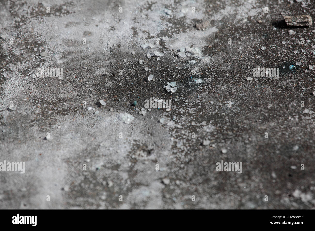 Salt crystals on pavement Stock Photo - Alamy
