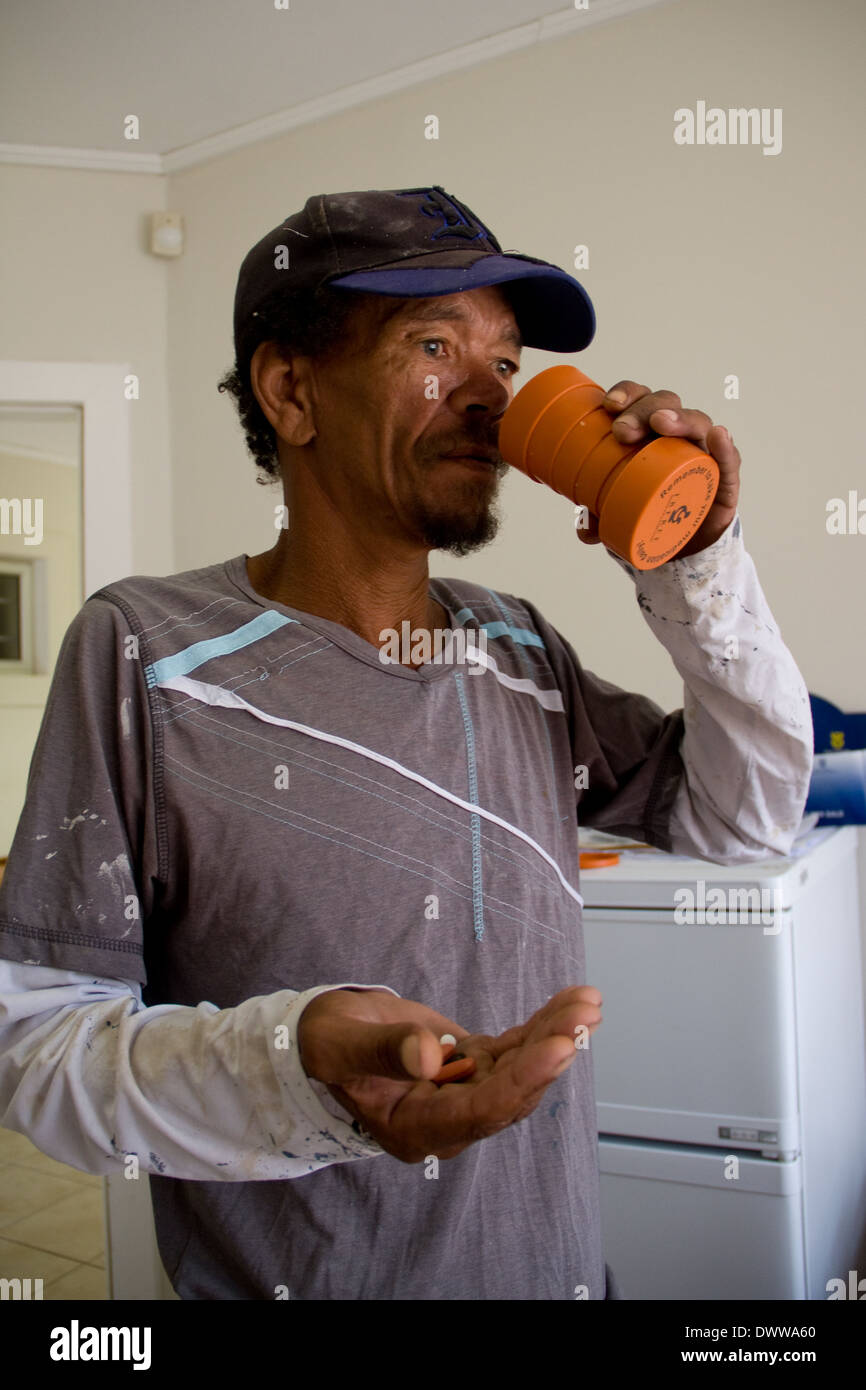 TB patients visit the clinc daily to receive their medication and must ...