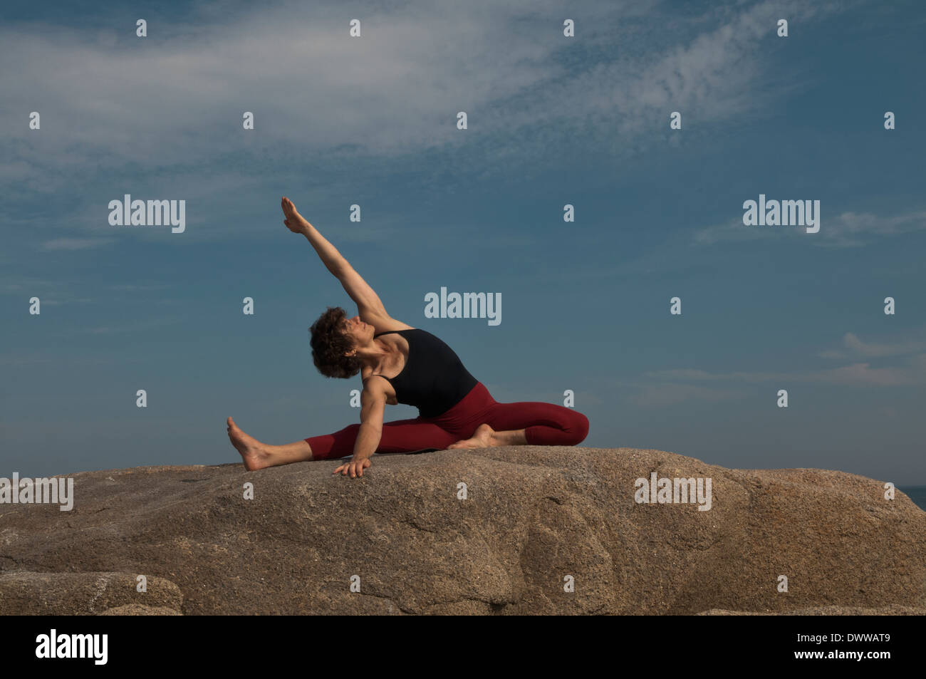 Iyengar Yoga Instructor Demonstrates Parivritta Janu Sirsasasa (Twist ...