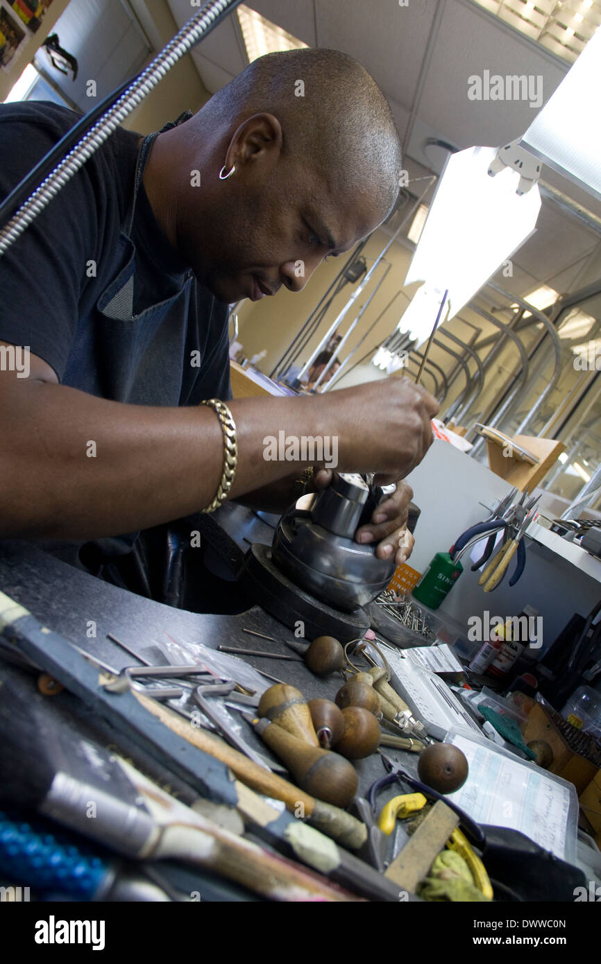 Stone setter Clive Alies ensure the correct and secure setting of ...