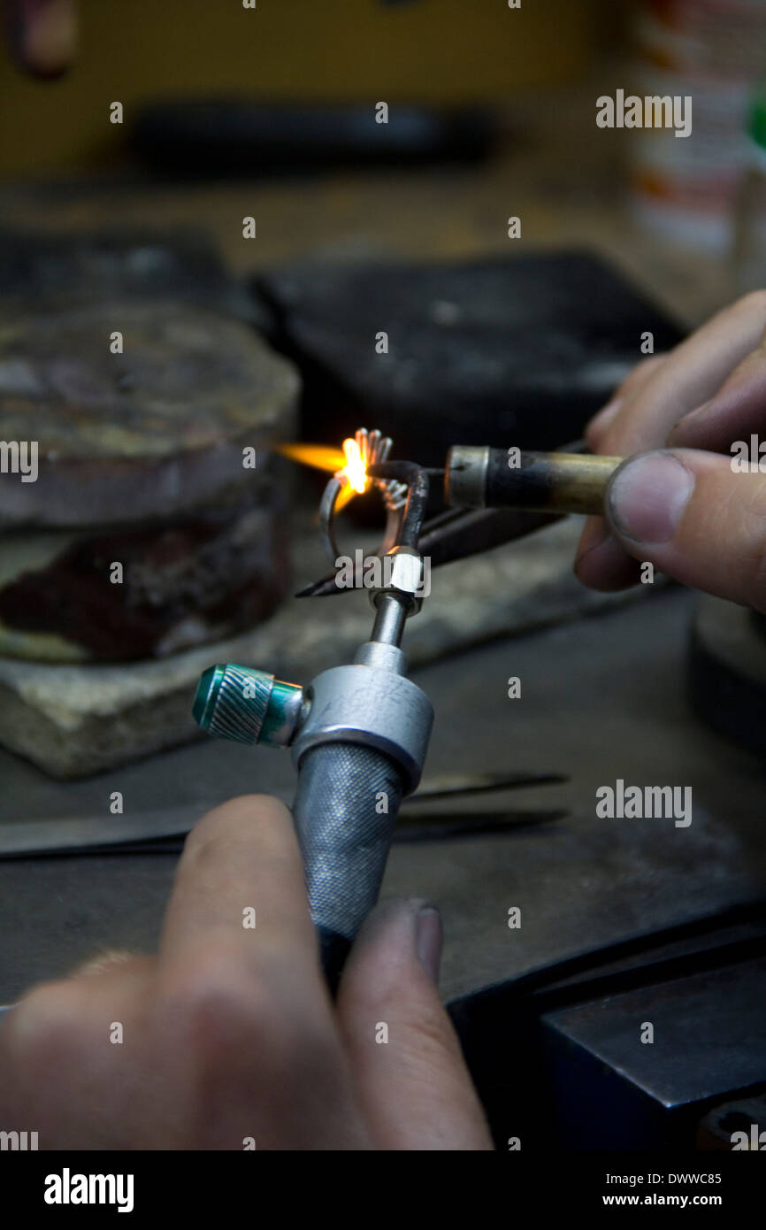 Stone setter Clive Alies ensure the correct and secure setting of ...