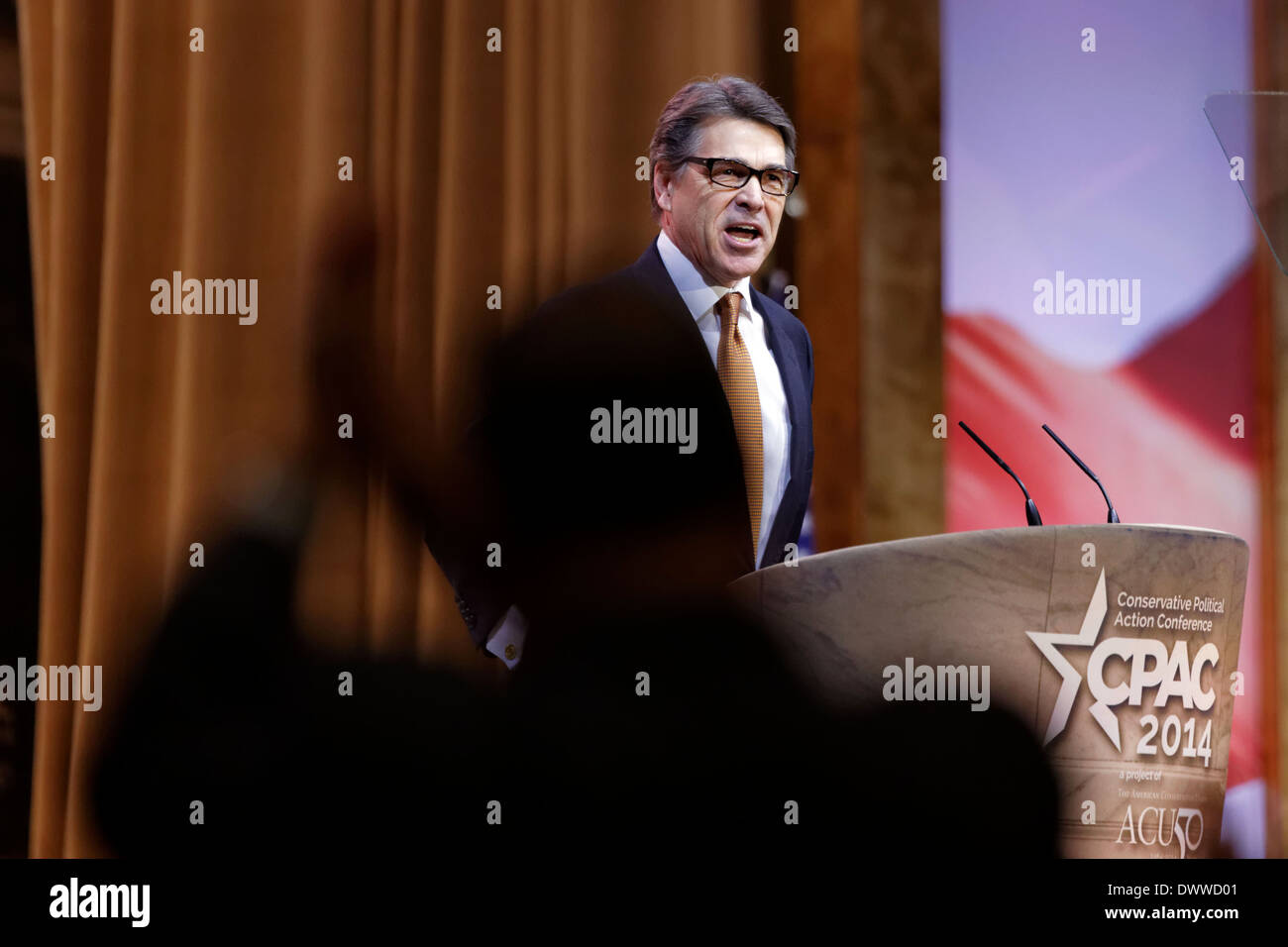 Texas Governor Rick Perry makes a speech at the 2014 CPAC conference in ...