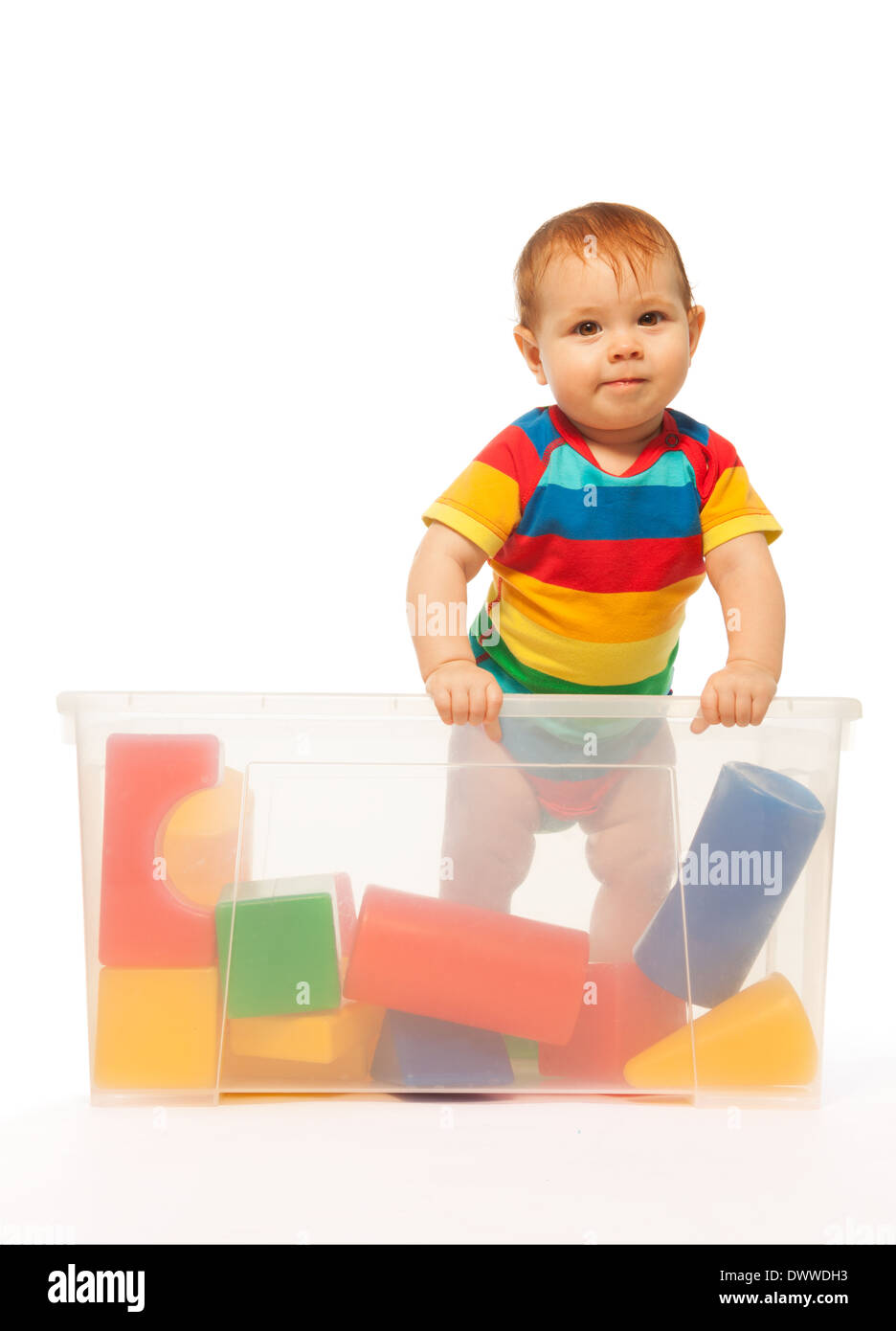 Toddler play in basket with toy blocks Stock Photo - Alamy