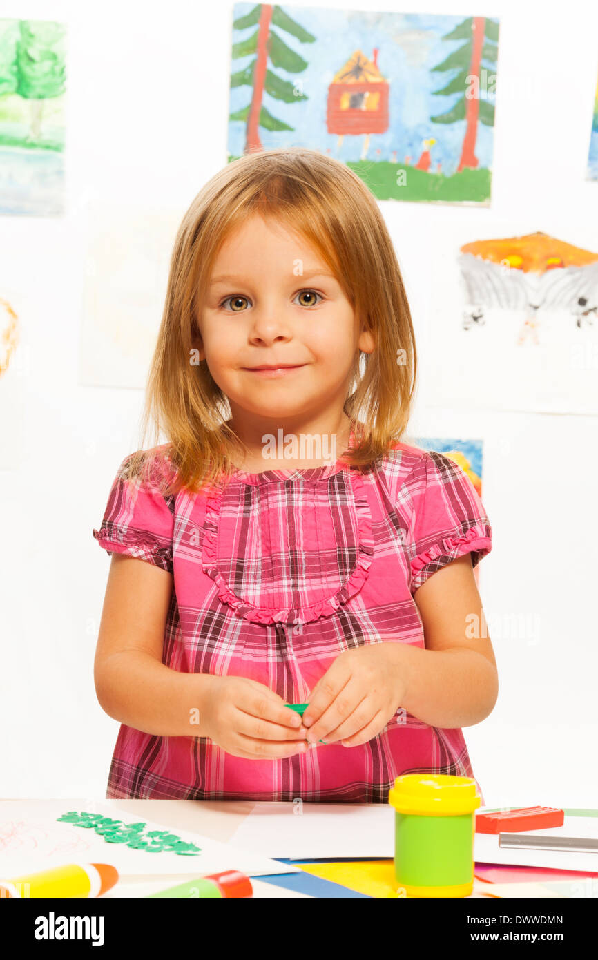Little happy little young girl gluing on creative art class Stock Photo ...