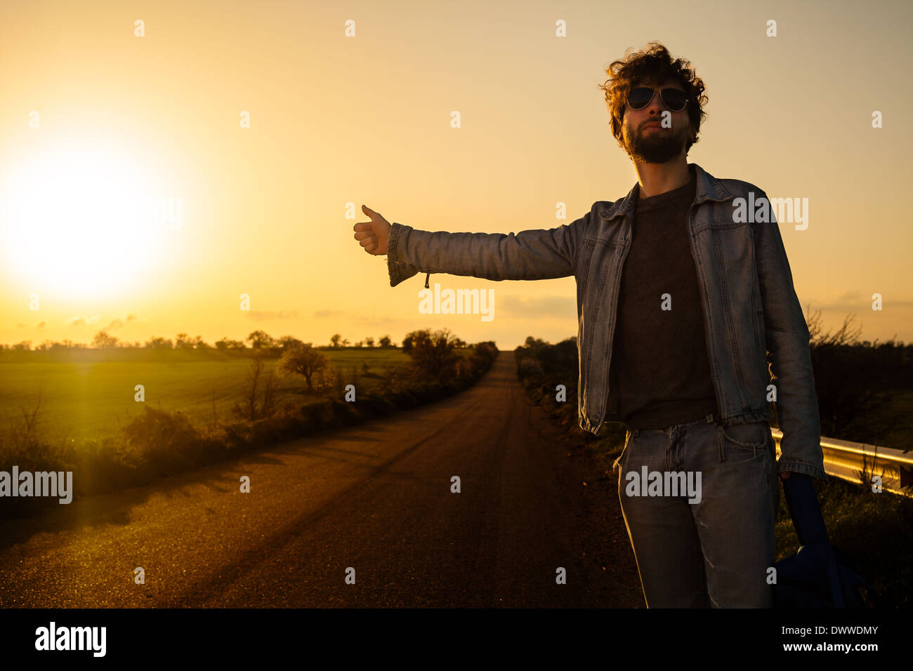 Hitchhiking man hi-res stock photography and images - Alamy