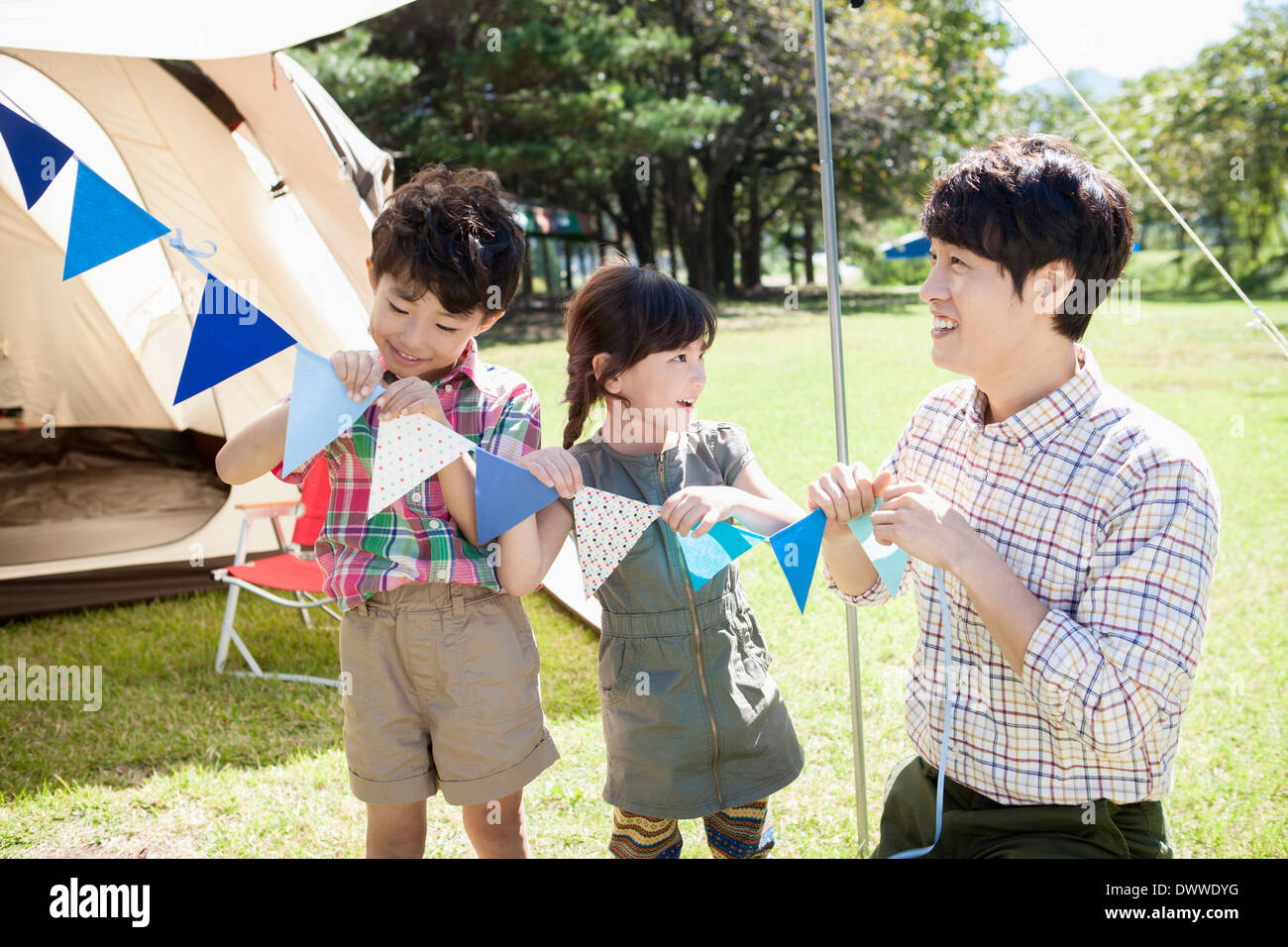 Kids building camping tent hi-res stock photography and images - Alamy