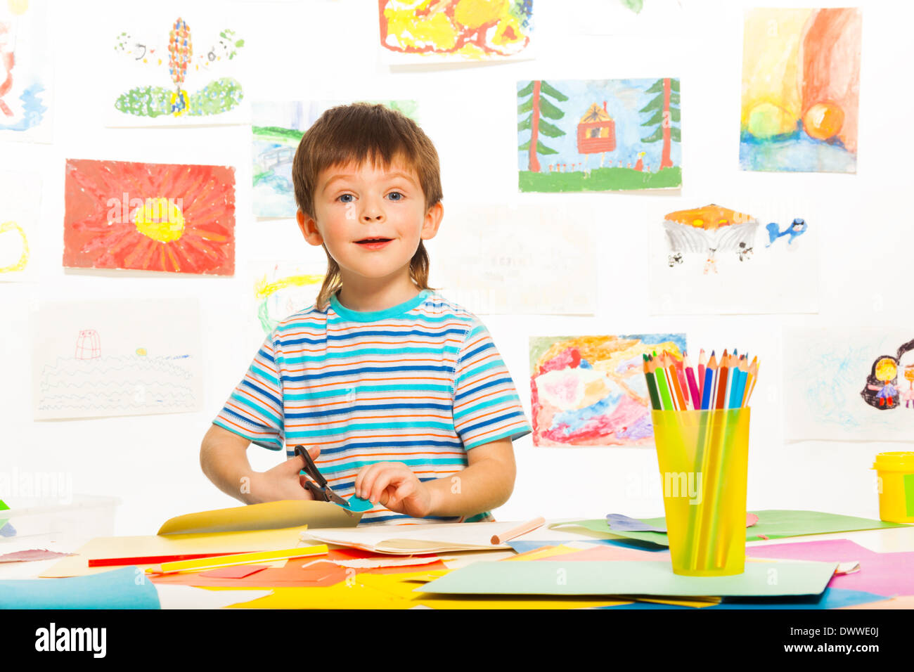 Boy cutting drawing scissors hi-res stock photography and images - Alamy