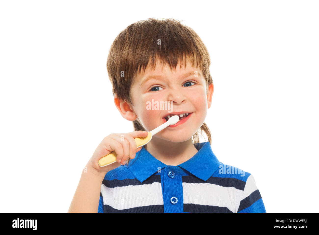 Close shoot of a boy brushing his teeth with toothbrush isolated on ...