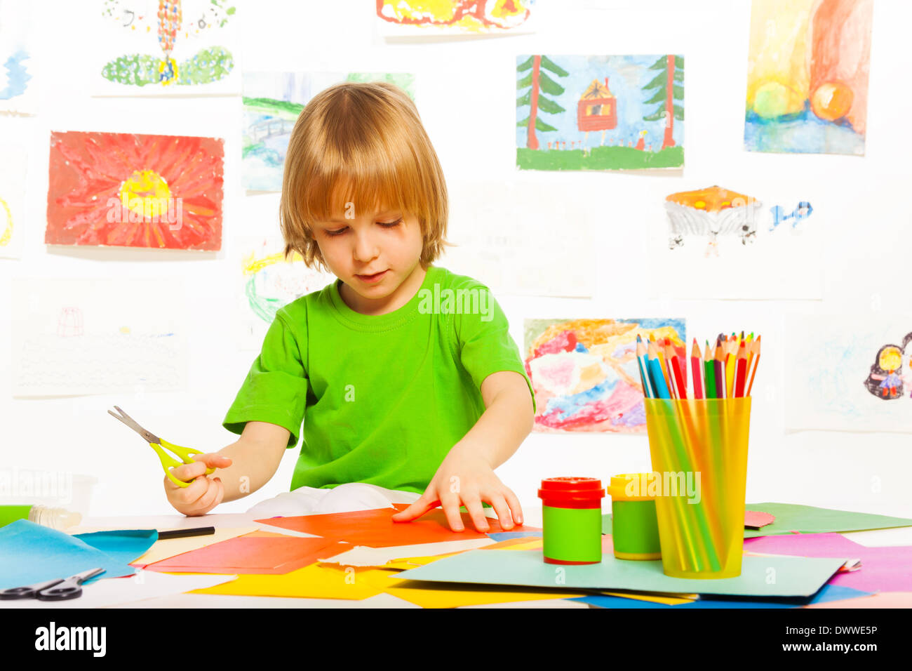 Boy cutting drawing scissors hi-res stock photography and images - Alamy
