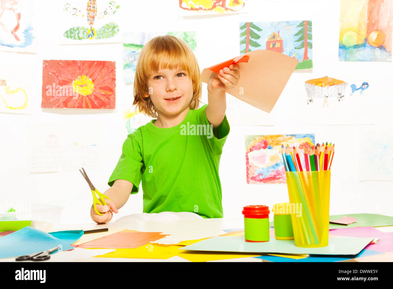 Boy cutting drawing scissors hi-res stock photography and images - Alamy