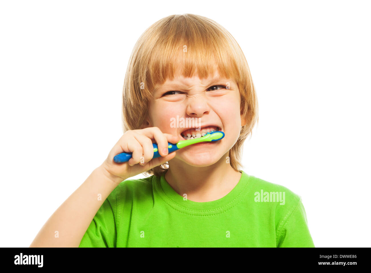 Blond 4 years old boy boy brushing teeth with toothpaste Stock Photo ...
