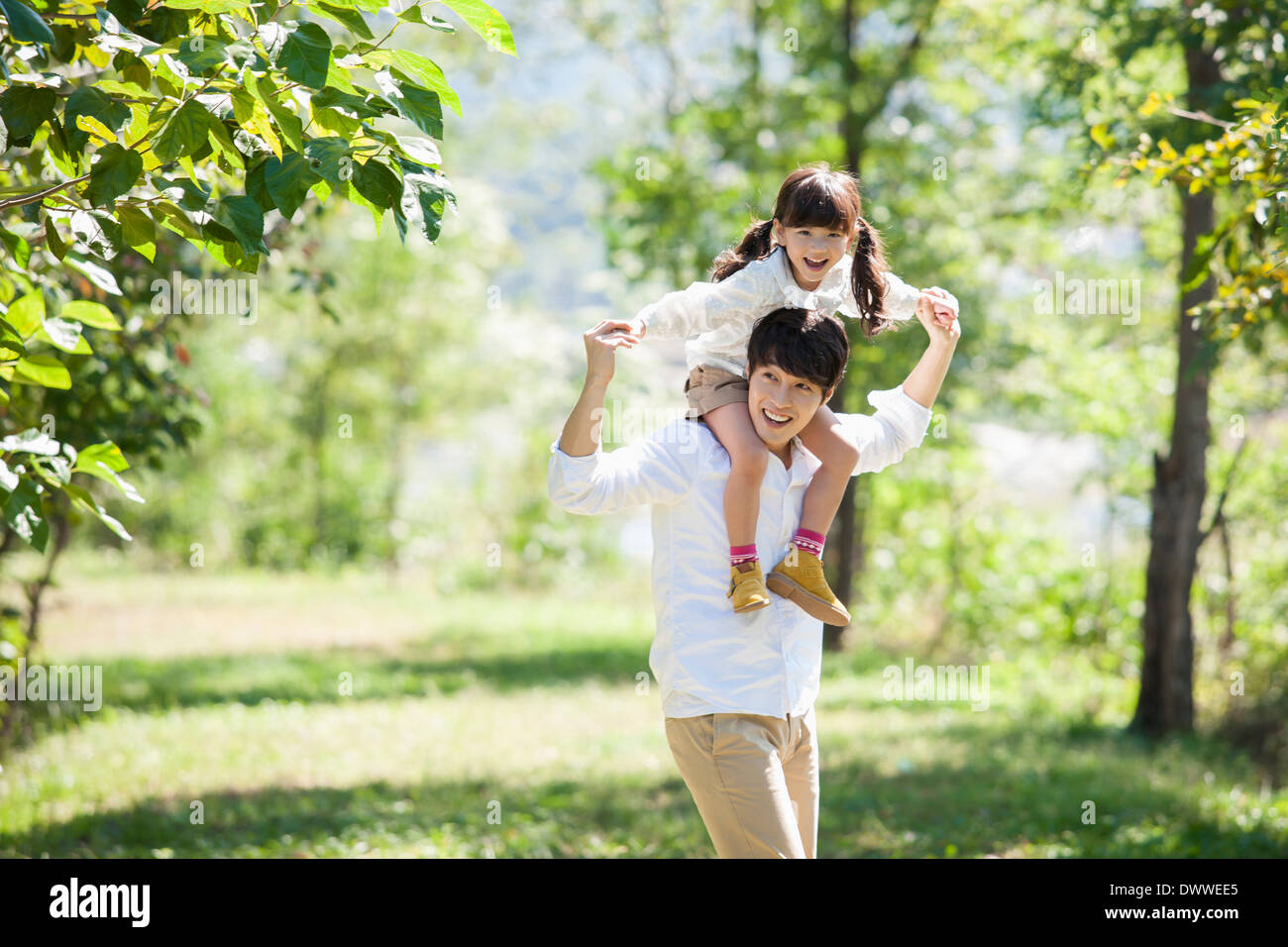 a father and a kid having a walk in the nature Stock Photo - Alamy