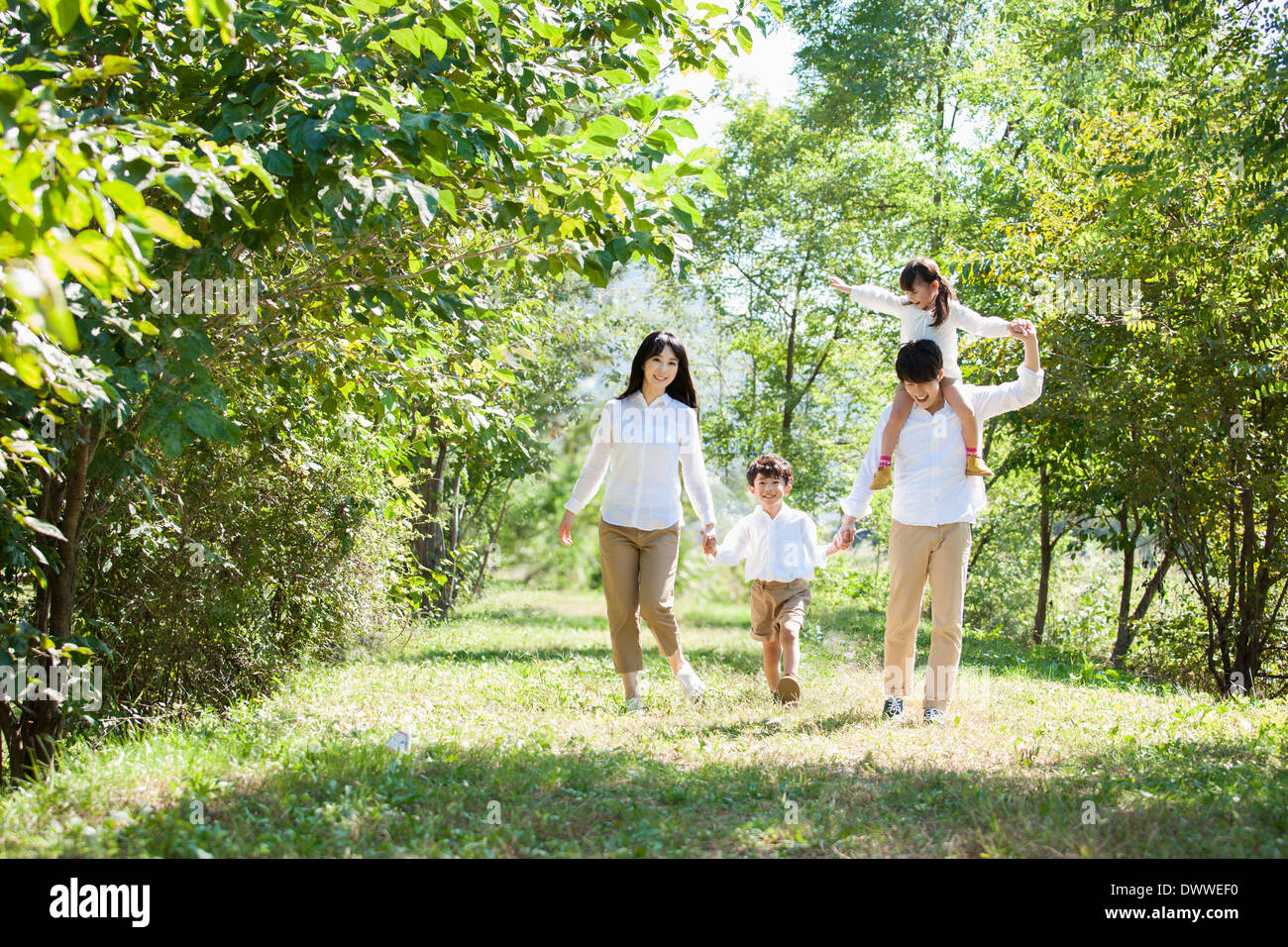a family having a walk in the nature Stock Photo - Alamy