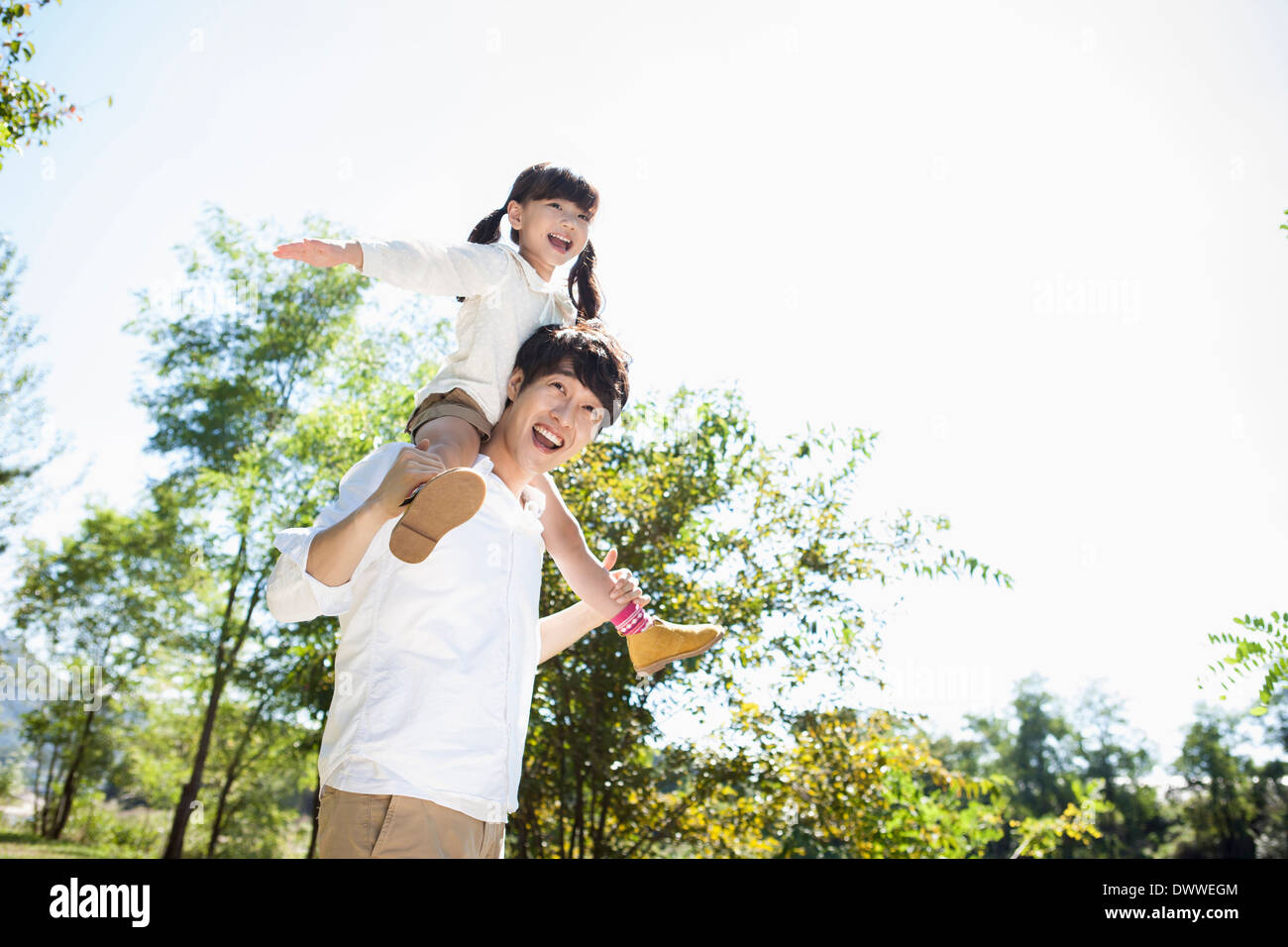 a father and a kid having a walk in the nature Stock Photo - Alamy
