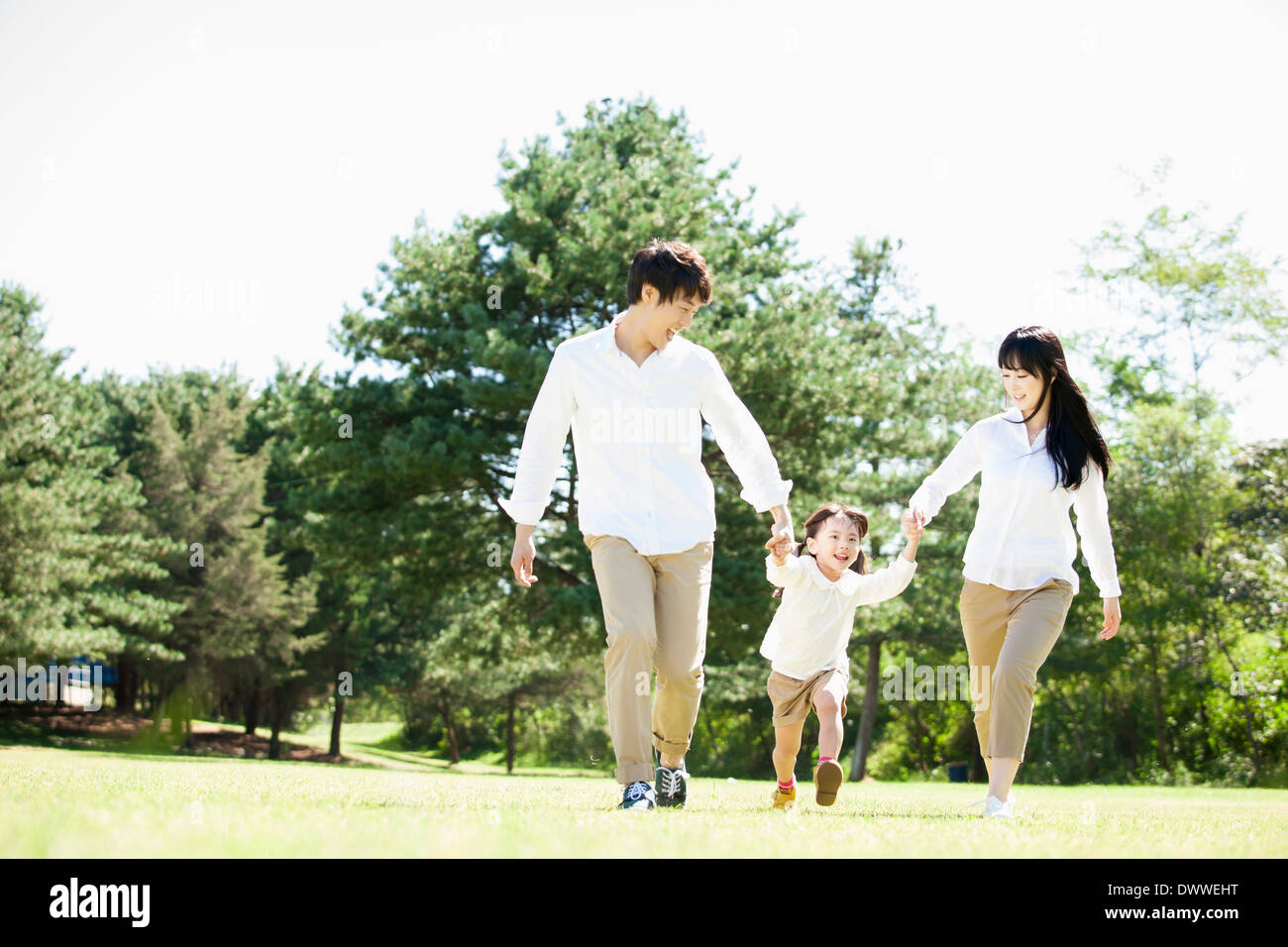 a family having a walk in the nature Stock Photo - Alamy