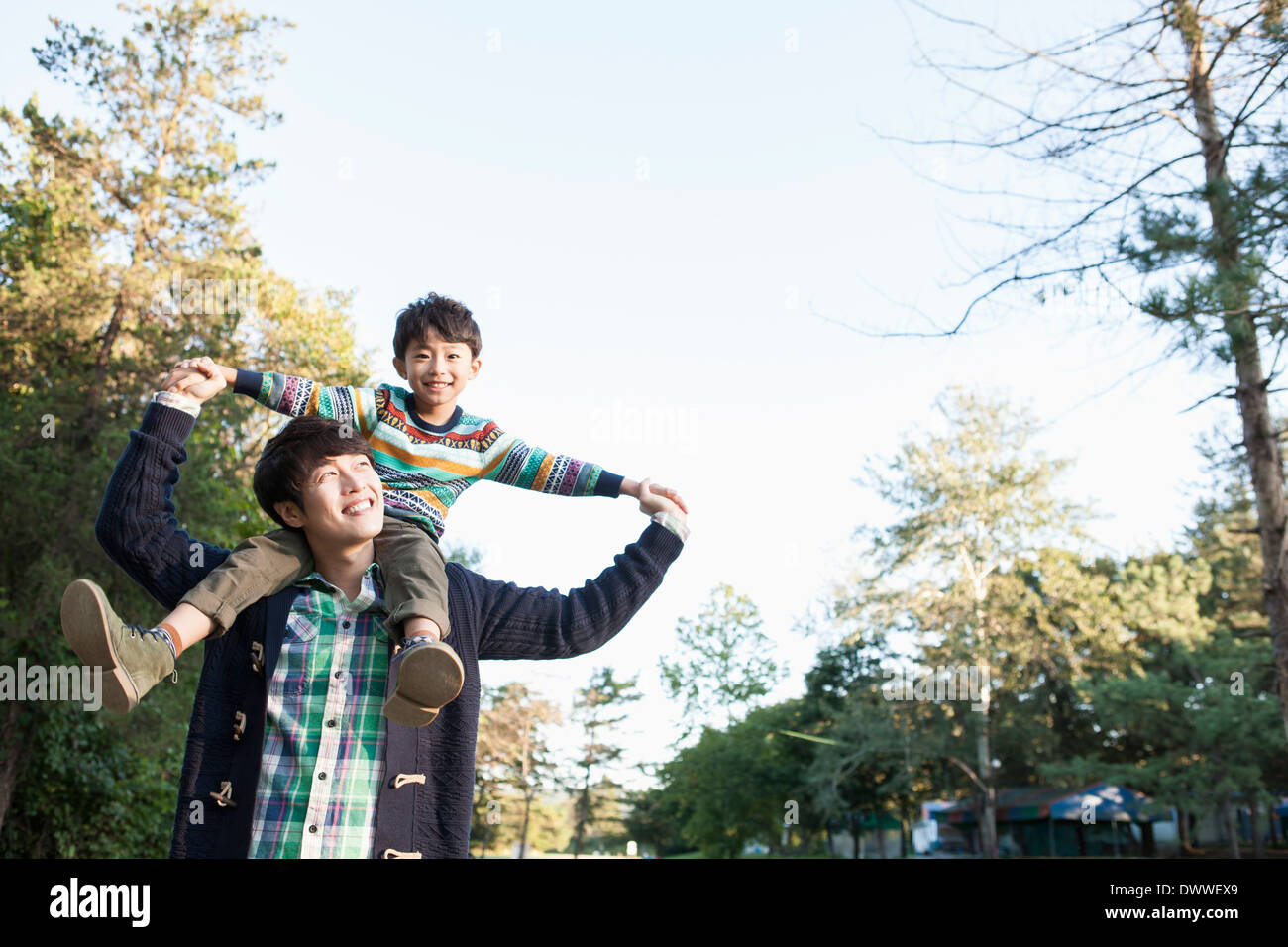 a father and a kid having a walk in the nature Stock Photo - Alamy