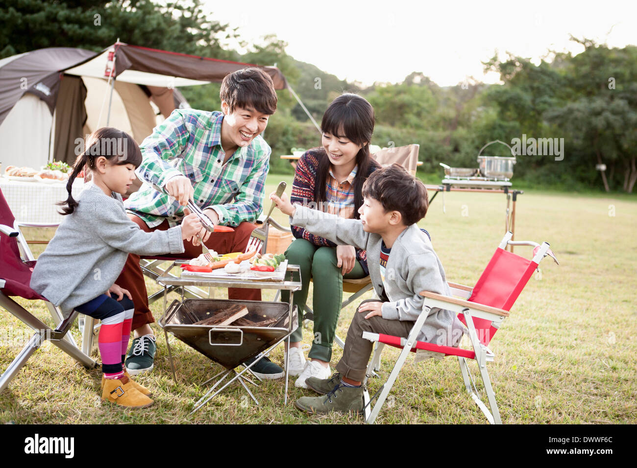 a family out camping Stock Photo - Alamy
