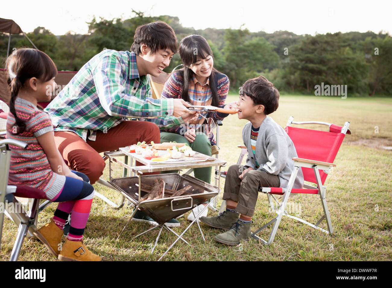 a family out camping Stock Photo - Alamy