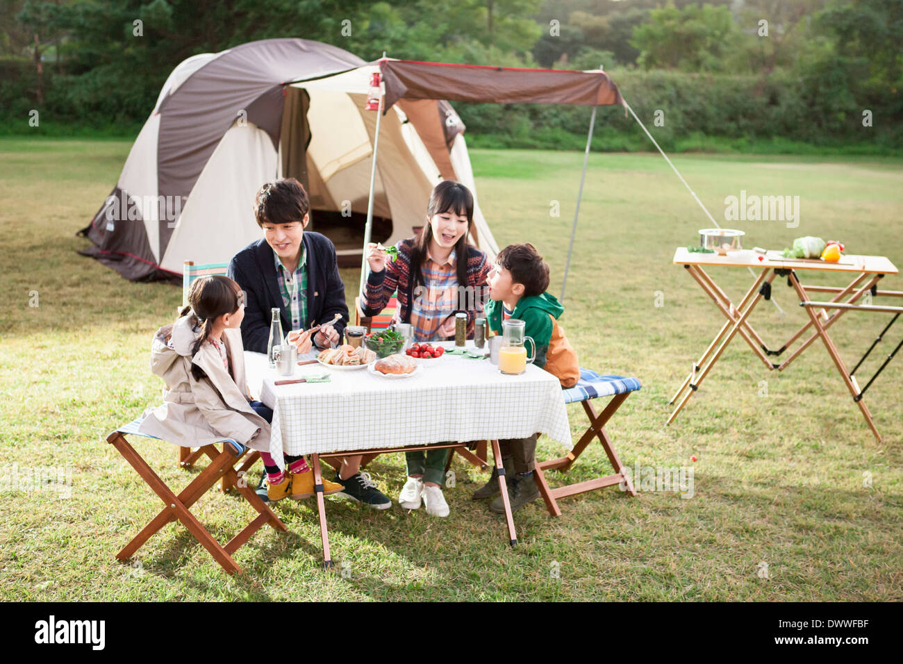 a family out camping Stock Photo - Alamy