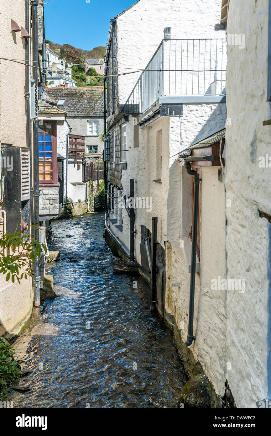 looe fishing village stream flowing through the houses Stock Photo - Alamy