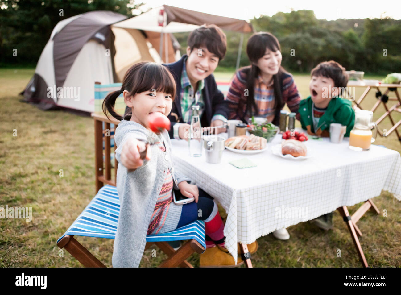 a family out camping Stock Photo - Alamy