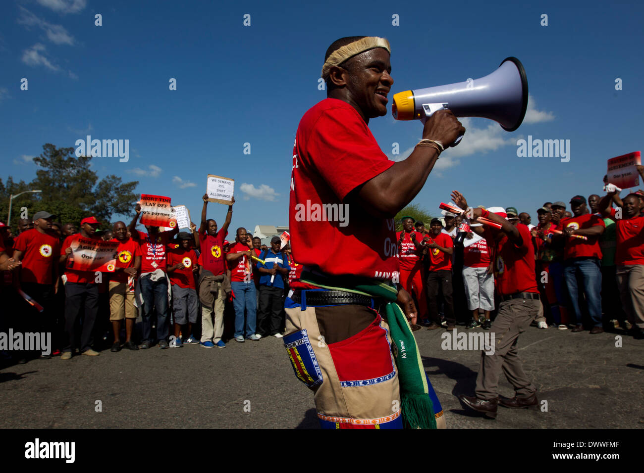 Members of the National Union of Metalworkers of South Africa continue ...
