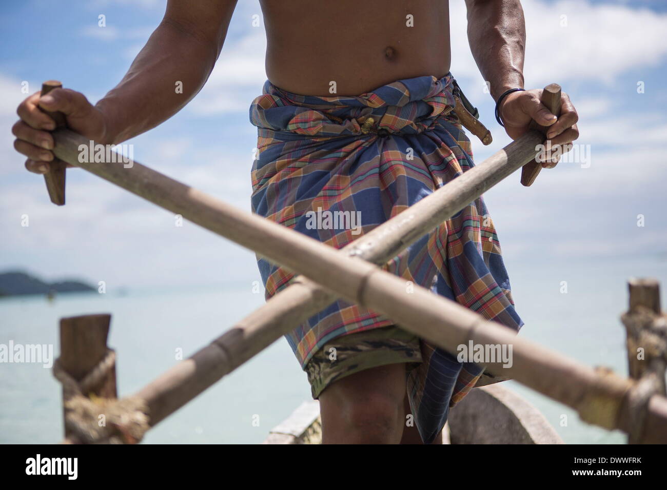 Oct 11, 2013 - Ko Surin, Thailand - Nguy, an indigenous Moken man, rows ...