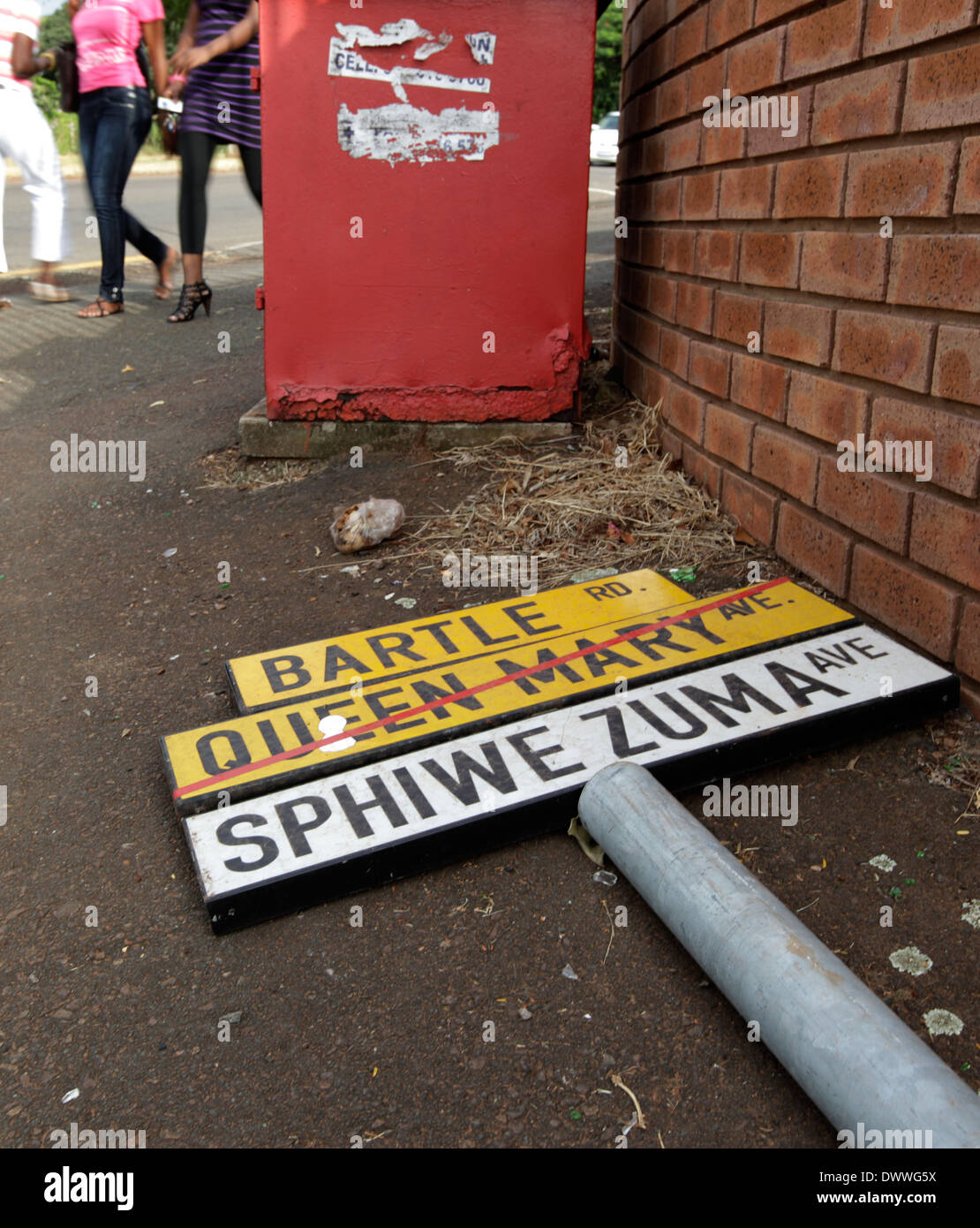 New and old street signs lie on the pavement in Durban, 23 March 2010 ...