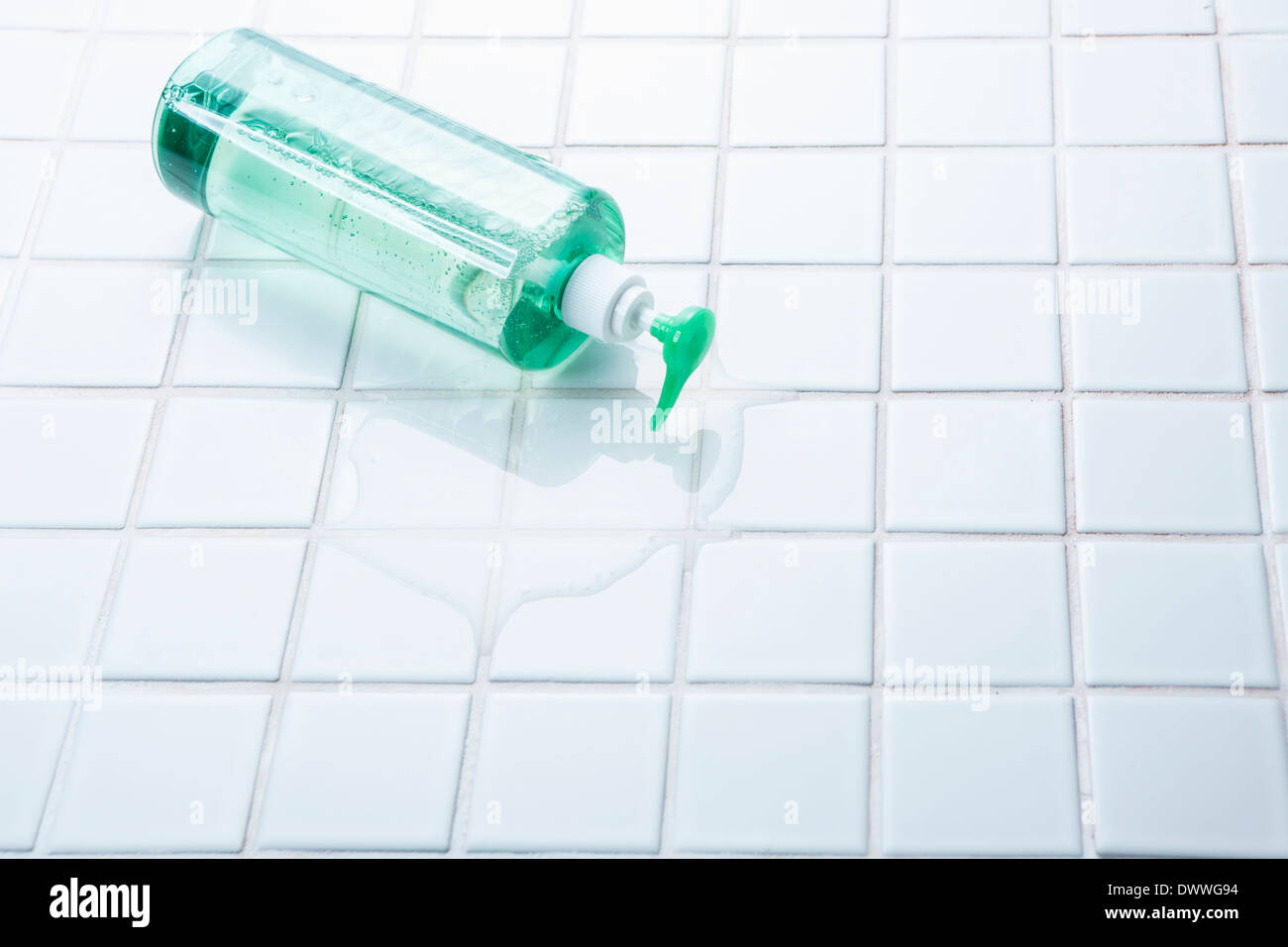 a soap pump on the floor Stock Photo - Alamy