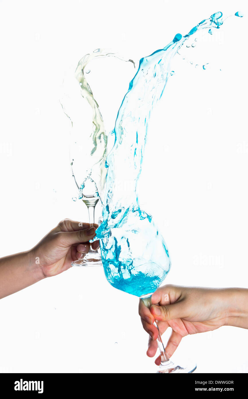 wine glass spilling liquid Stock Photo - Alamy