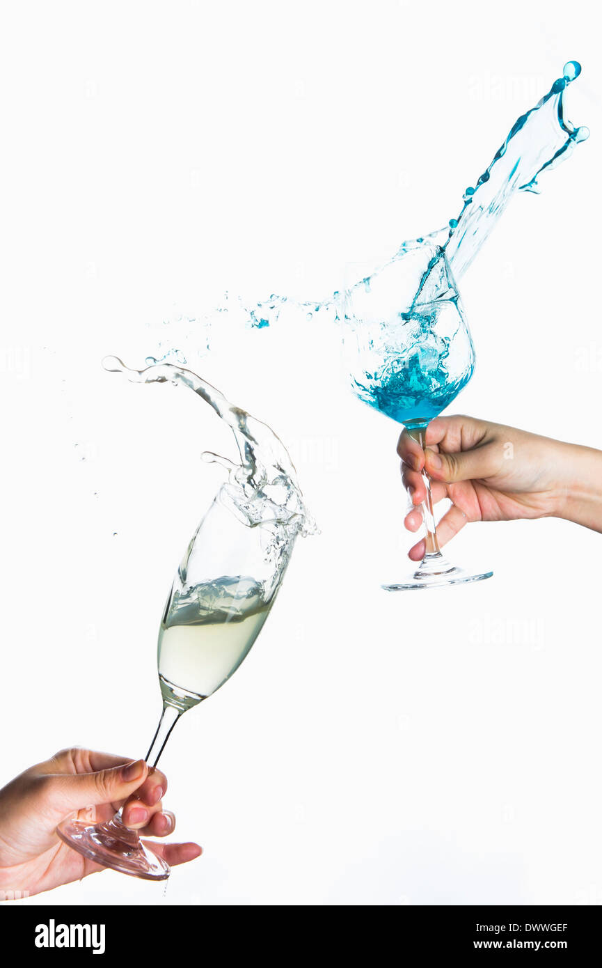 wine glass spilling liquid Stock Photo - Alamy