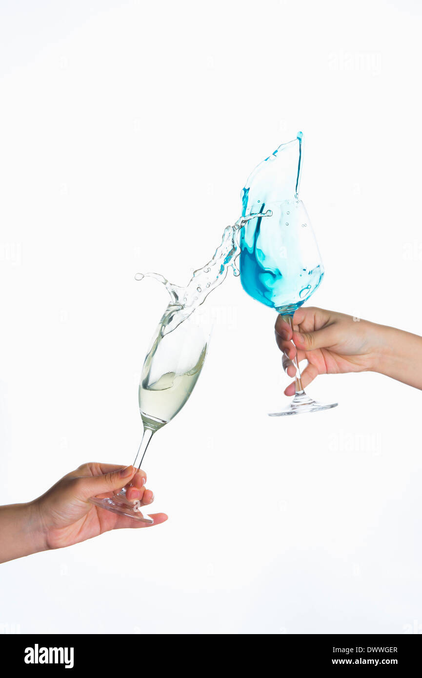 wine glass spilling liquid Stock Photo - Alamy