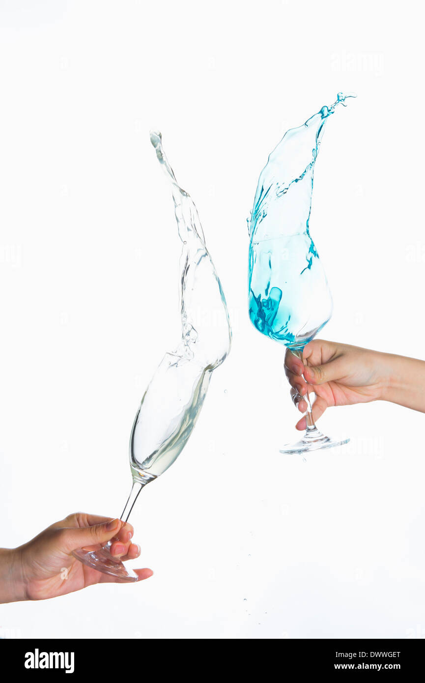 wine glass spilling liquid Stock Photo - Alamy