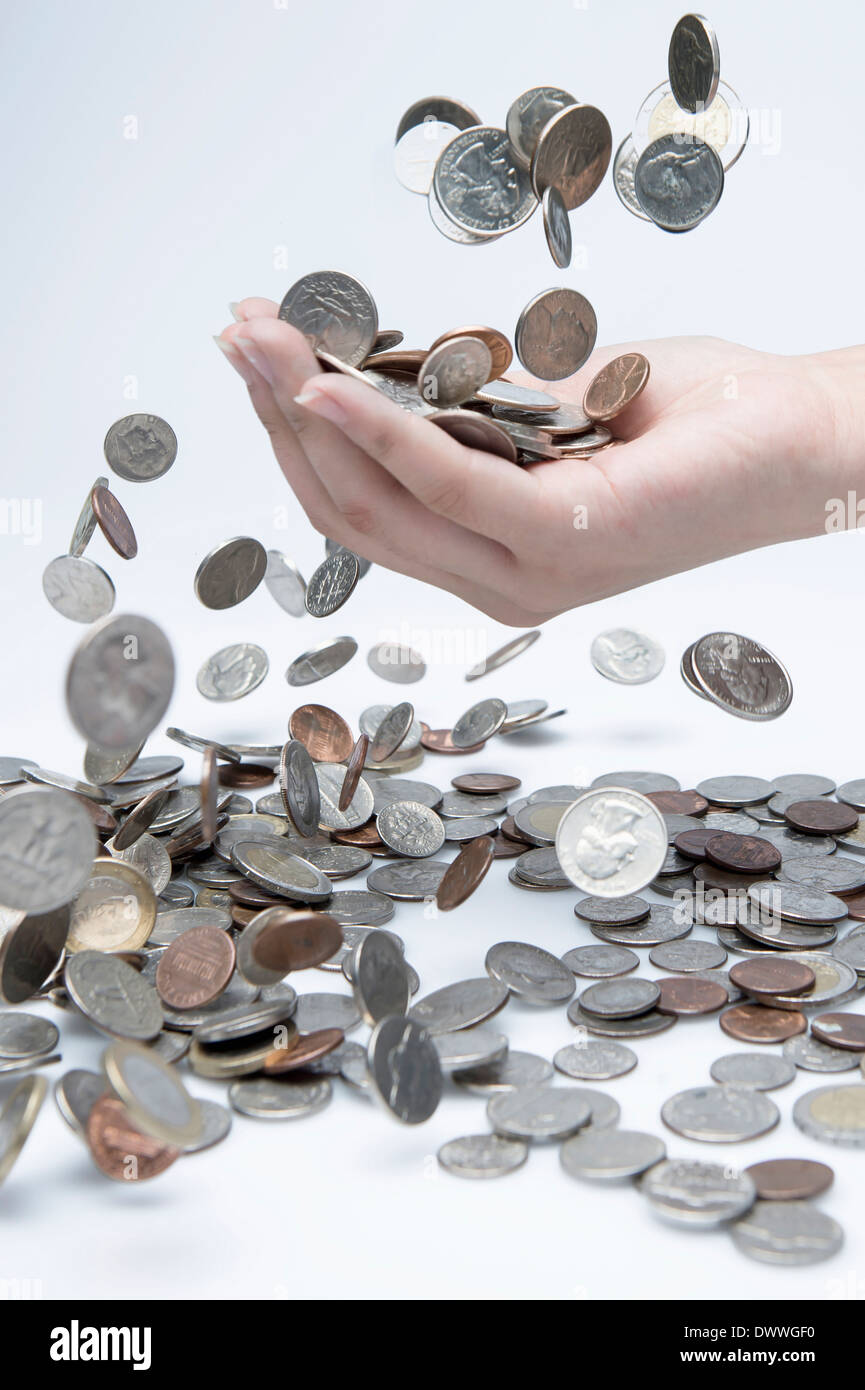 hands catching coins Stock Photo - Alamy